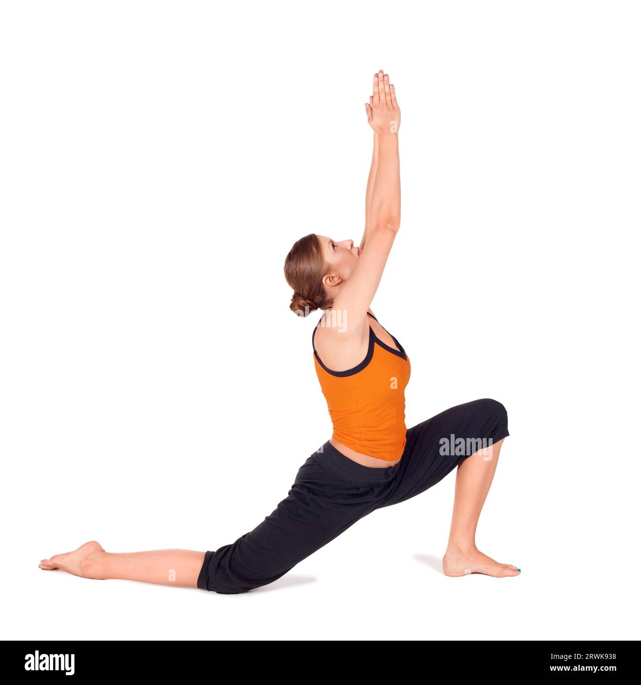 Woman practicing yoga exercise called Crescent Lunge, sanskrit name ...