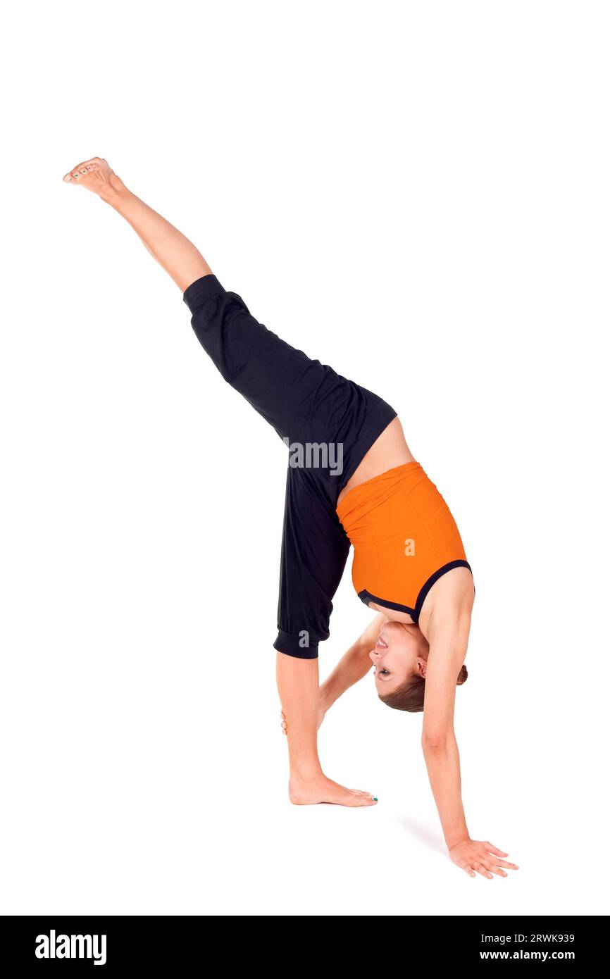 Woman practicing yoga exercise called: Standing Split, sanskrit name ...