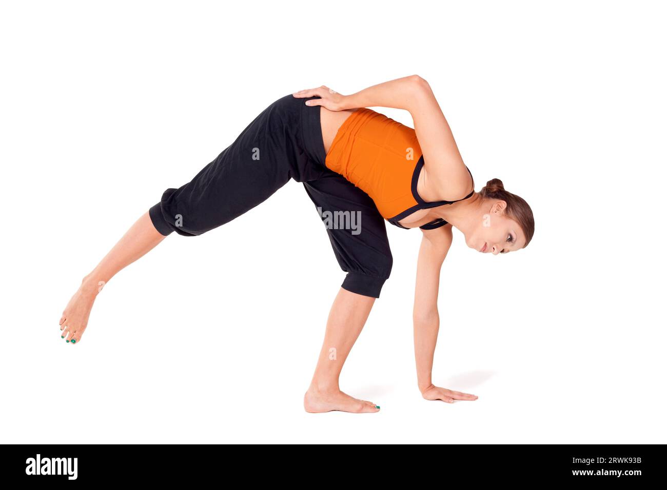 Fit attractive young woman doing first stage of yoga exercise called ...