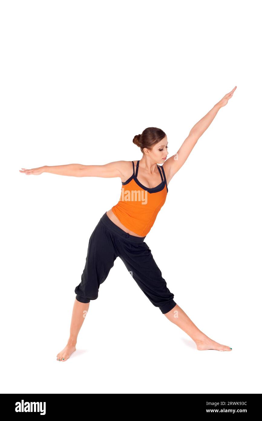 Fit attractive young woman doing first stage of yoga exercise called ...