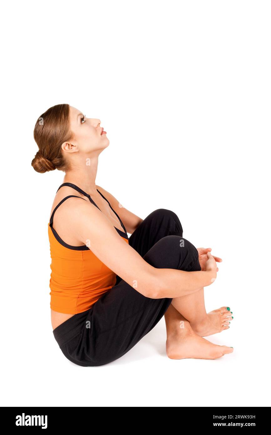 Fit woman doing neck stretching exercise good as a pain and stress ...