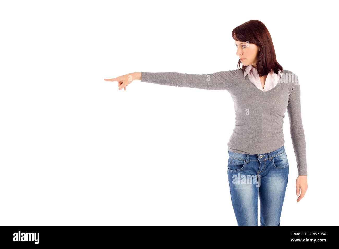 Young beautiful woman pointing, isolated on white background Stock ...
