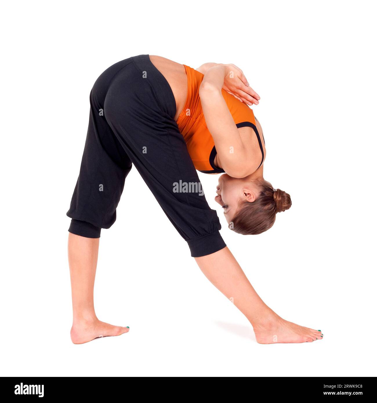 Woman doing yoga exercise called: Intense Side Stretch Pose, sanskrit ...