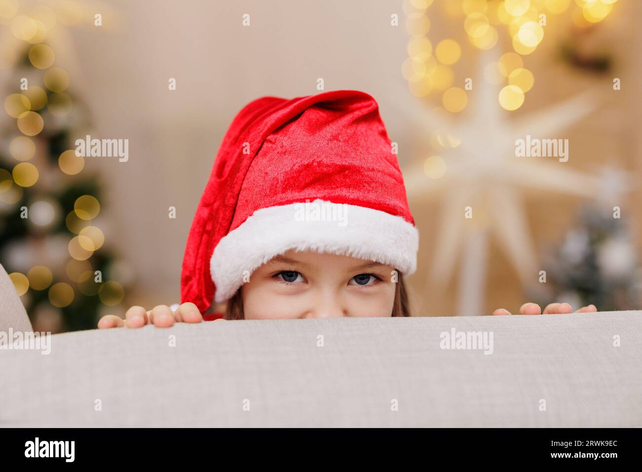 Santa claus portrait hiding face hi-res stock photography and images ...