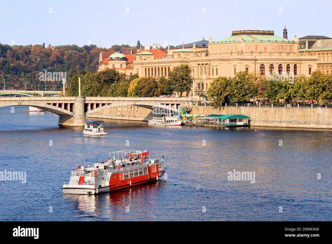 Prague scenery, passenger boats on Vltava river and Neo-Renaissance ...