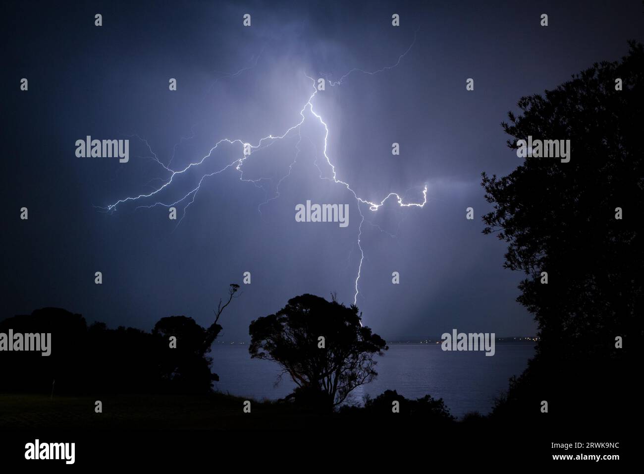 Bolts of lightning hit the ground during a heavy storm in Cowes ...
