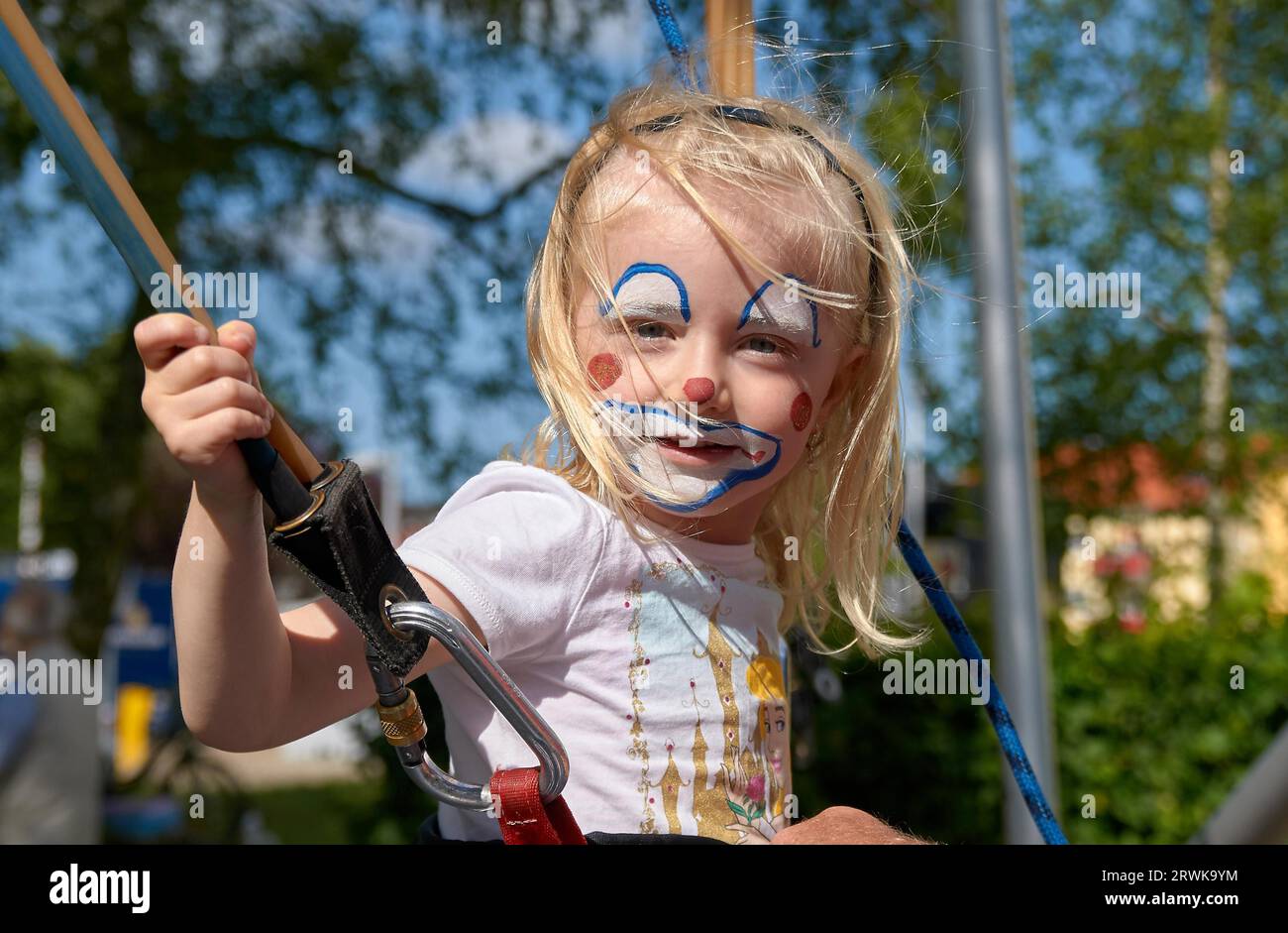 Child clown jumping Stock Photo - Alamy
