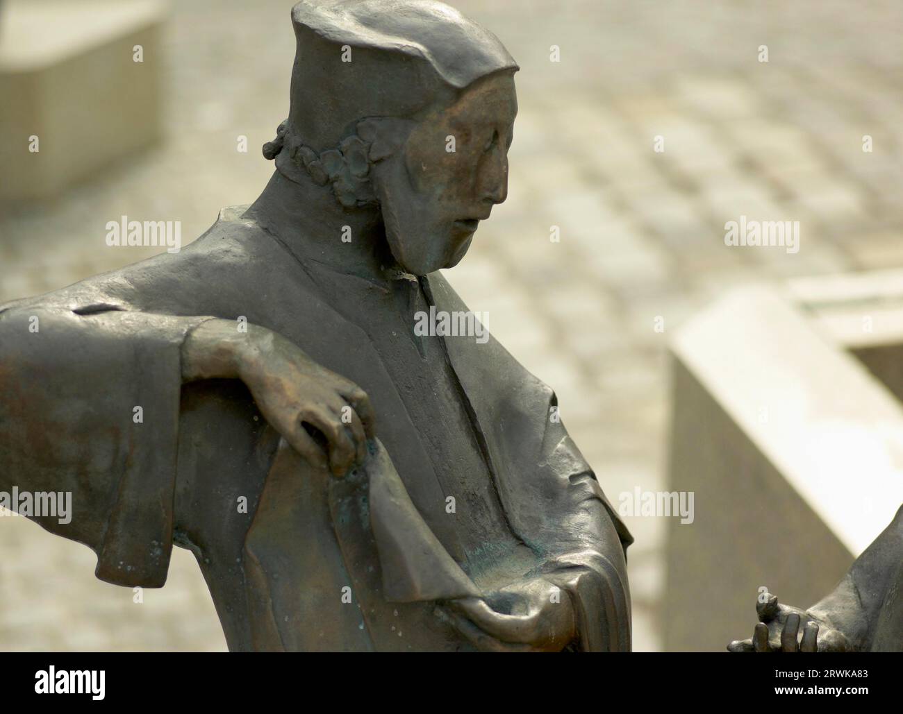 Buying scene at a medieval market. The customer is about to pay and the ...