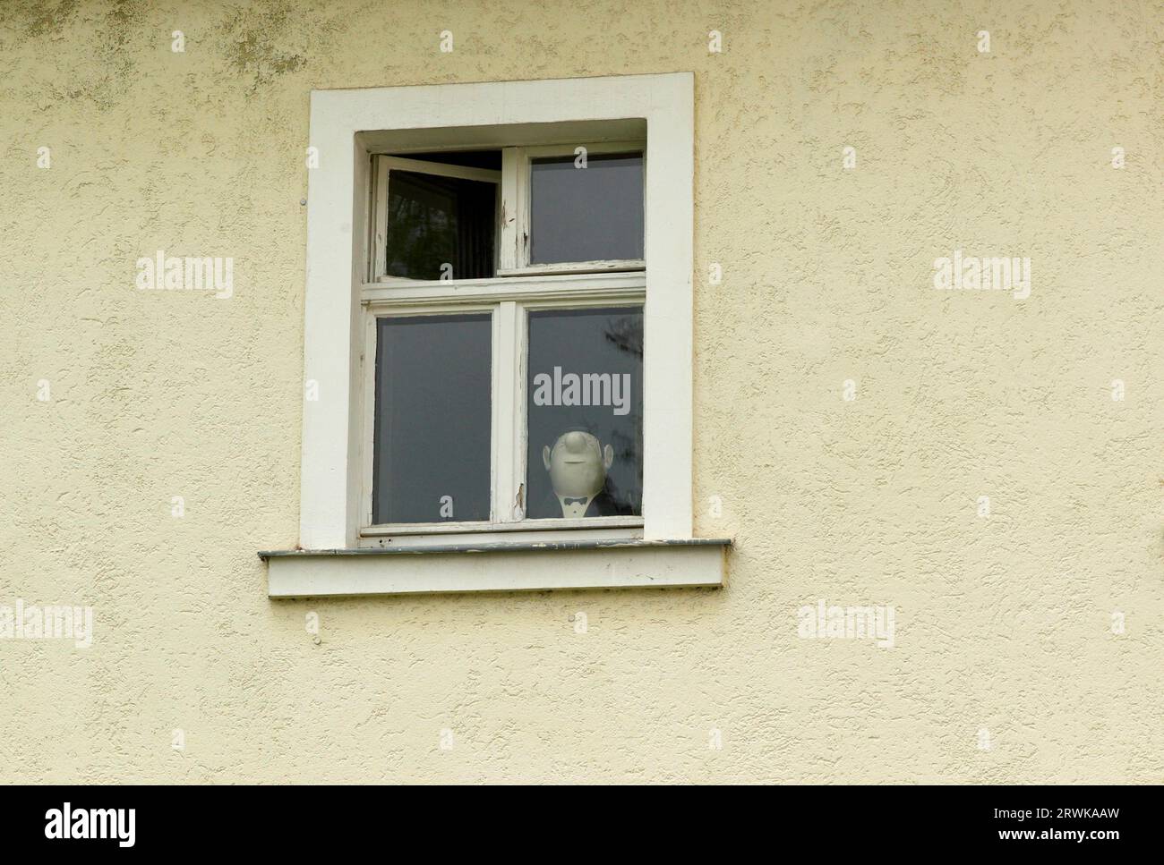 Doll at the window Stock Photo - Alamy