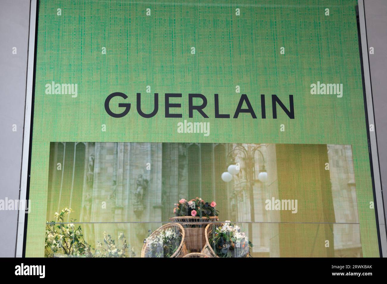 paris , France - 09 18 2023 : GUERLAIN sign text facade shop and logo ...