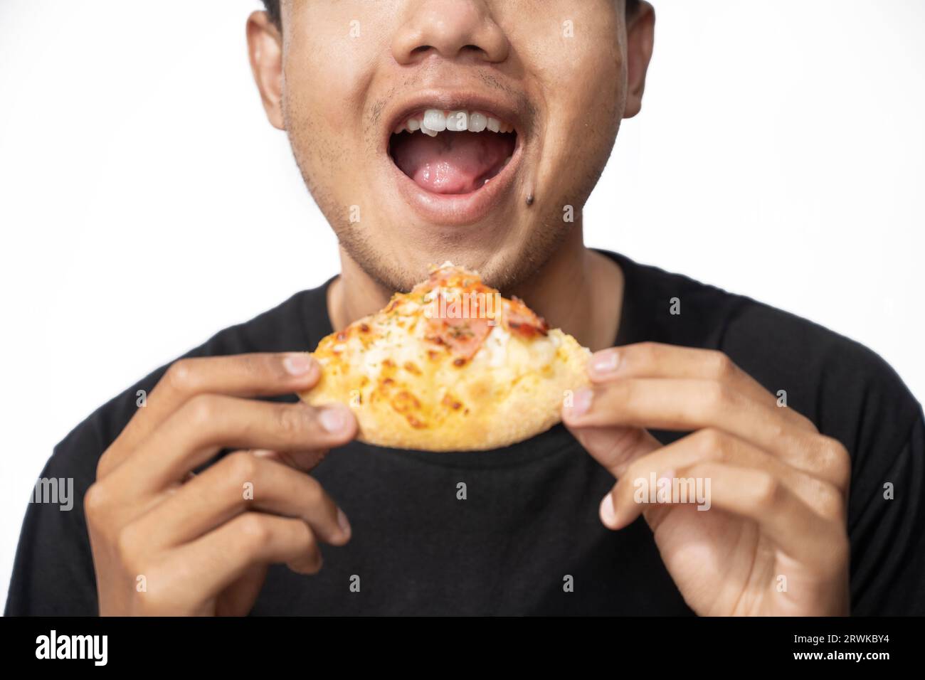 Man eating cheese slice hi-res stock photography and images - Alamy