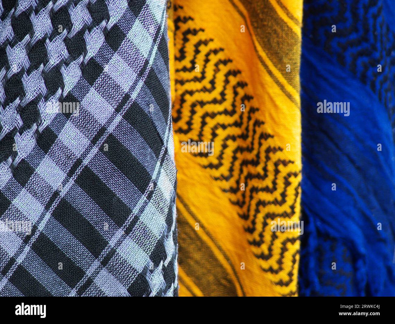 Three differently patterned scarves in different colours, format ...