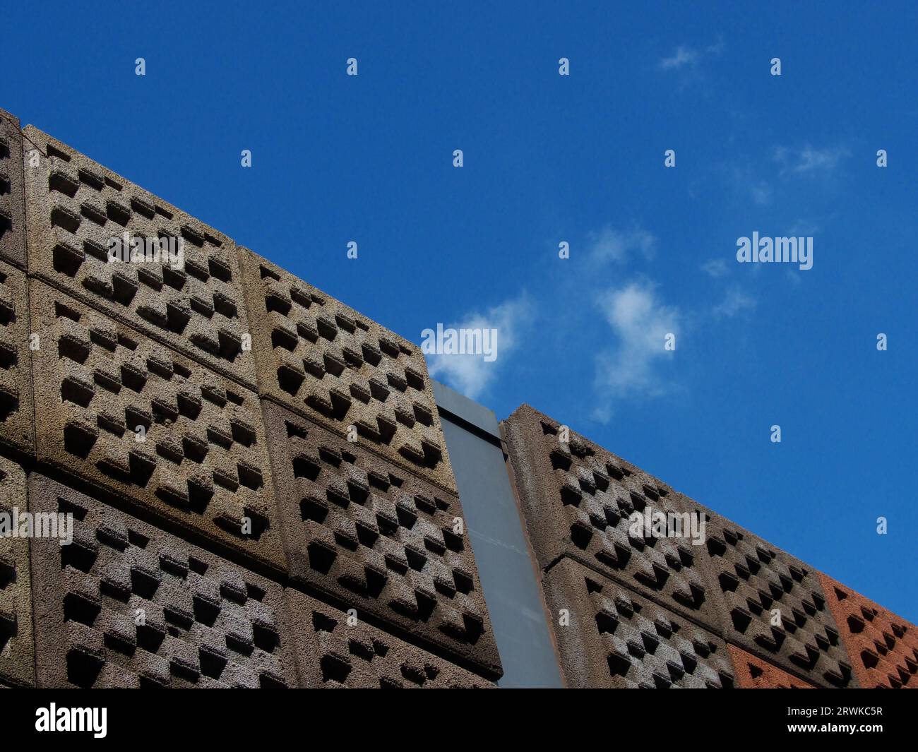 Noise barrier, consisting of different coloured hollow blocks, taken ...
