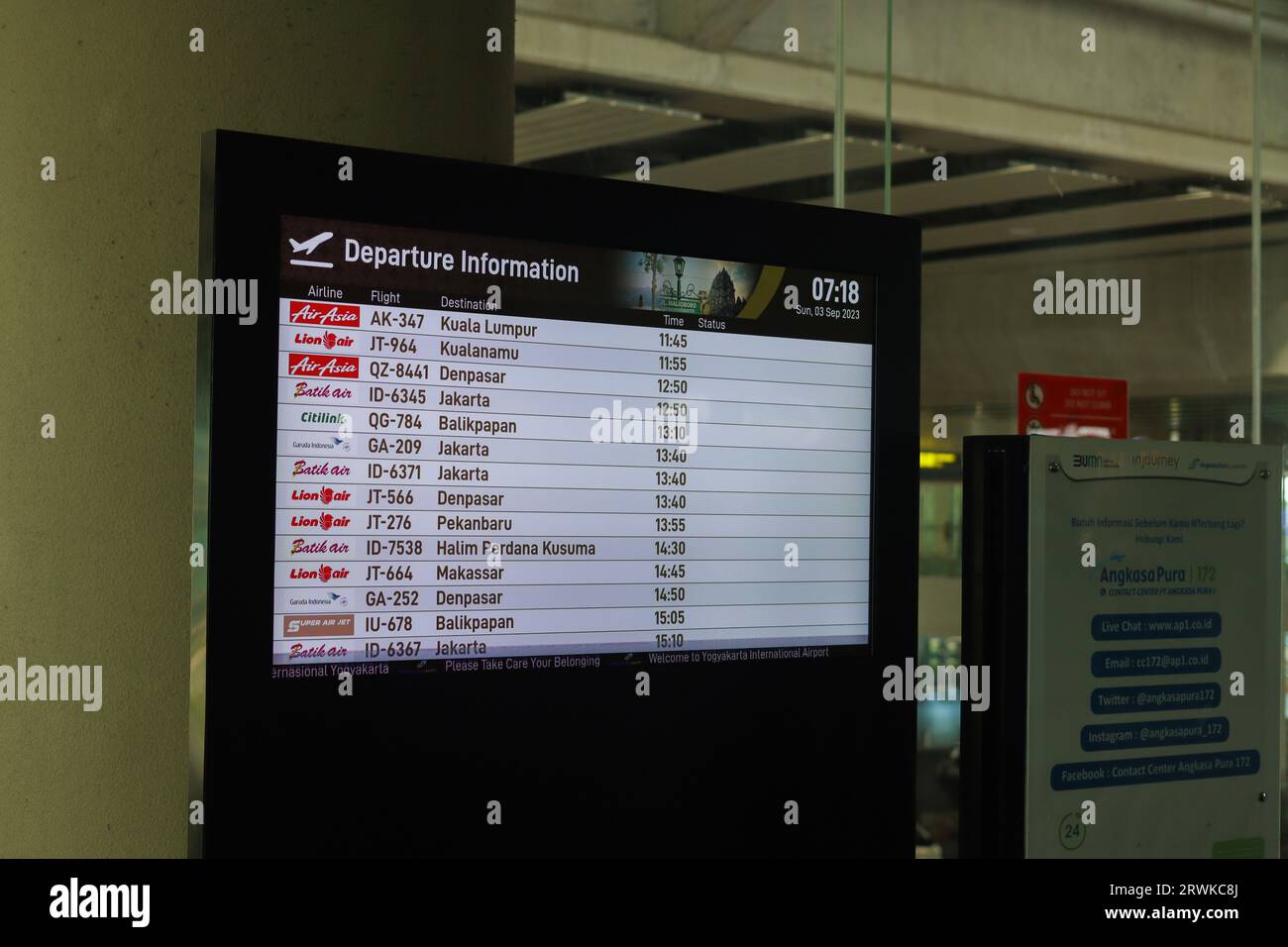 Flight information display system showing airline schedule. Yogyakarta ...