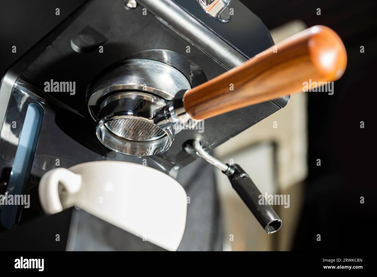 Portafilter on the coffee machine. Make espresso coffee Stock Photo - Alamy