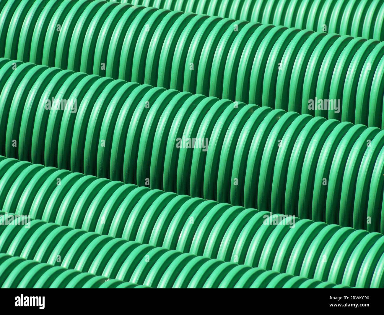 Several green drainage pipes, detail, full size Stock Photo - Alamy