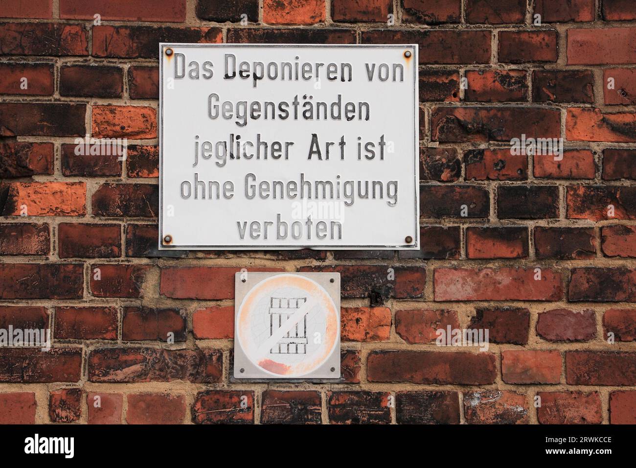 Two prohibition signs as text and symbol Stock Photo - Alamy