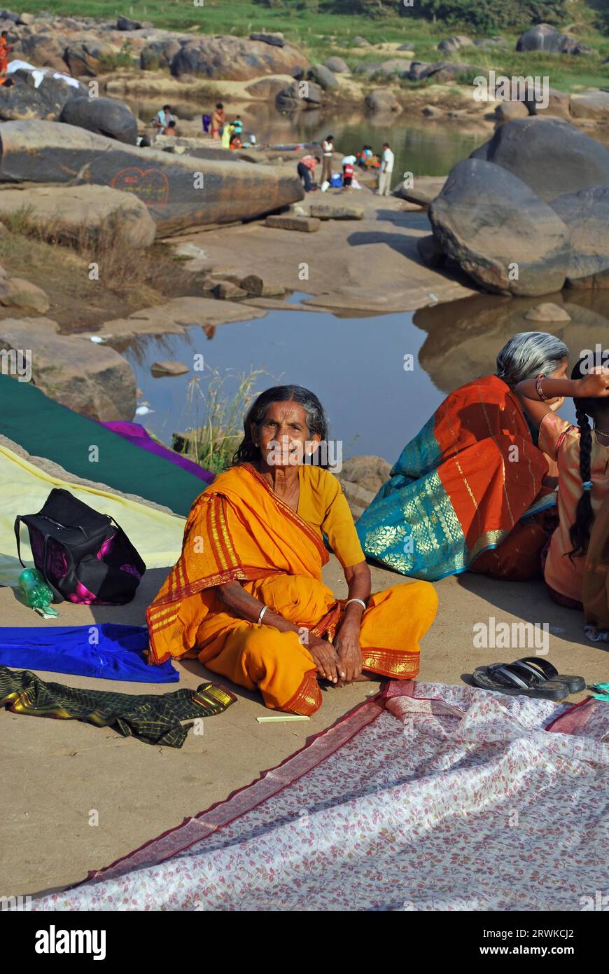 Indian women at the Tungabhadra River in Hampi, Karnataka, South India ...