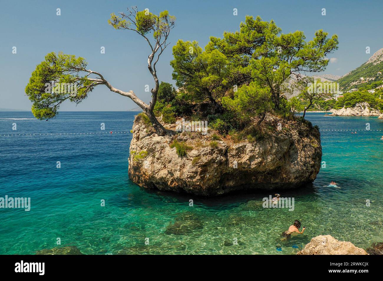 Famous rock on crystal clear water of Adriatic sea in Brela on Makarska ...