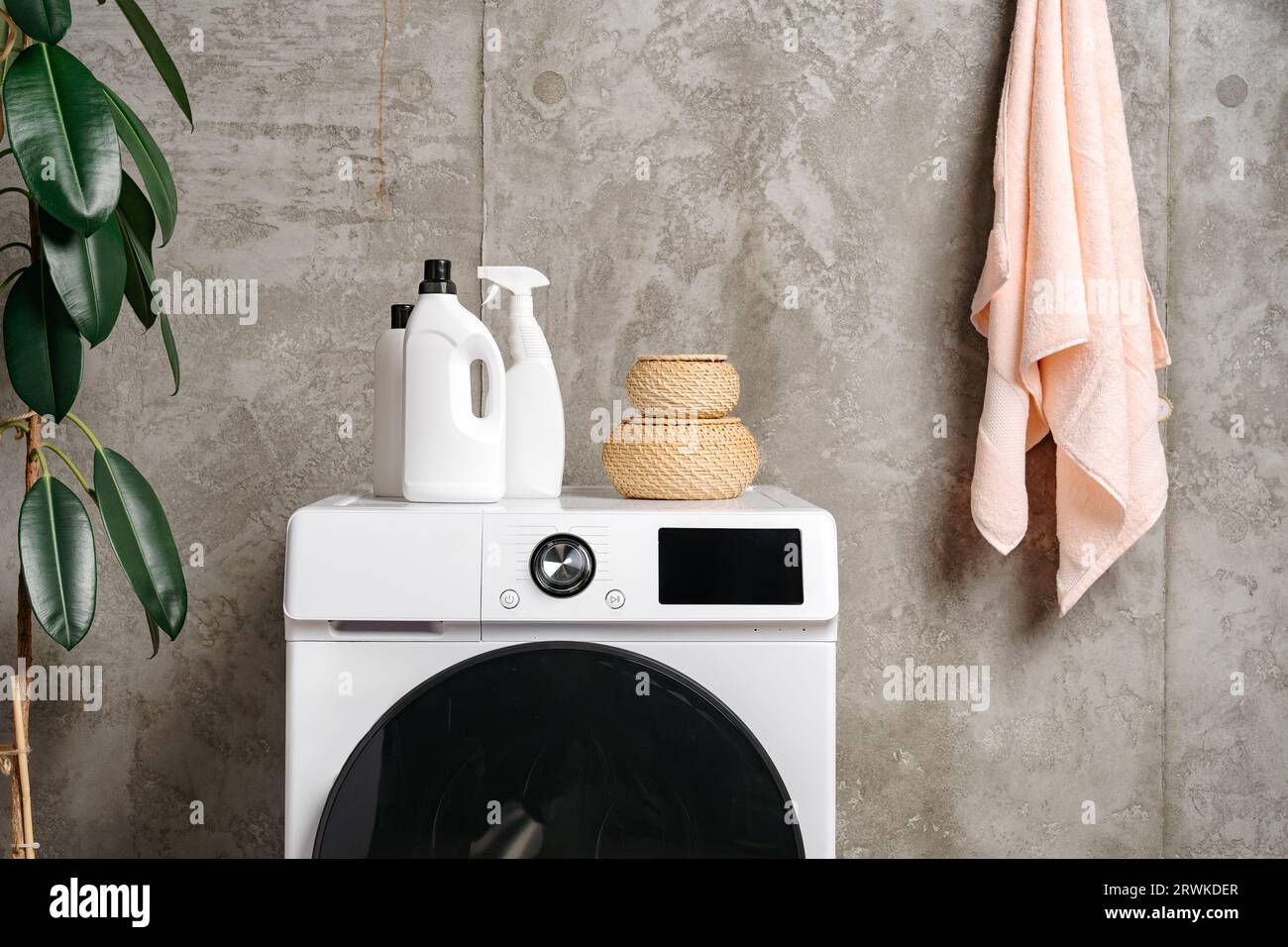Washing liquid detergents on washing machine in a laundry room Stock ...