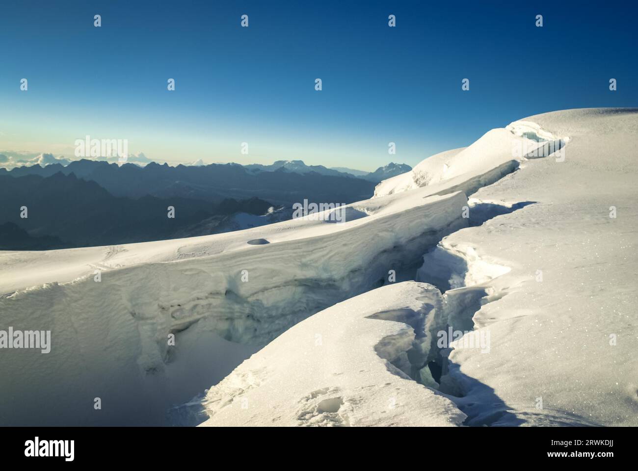 Photo of deep white snow and view from top of Huayna Potosi, mountain ...