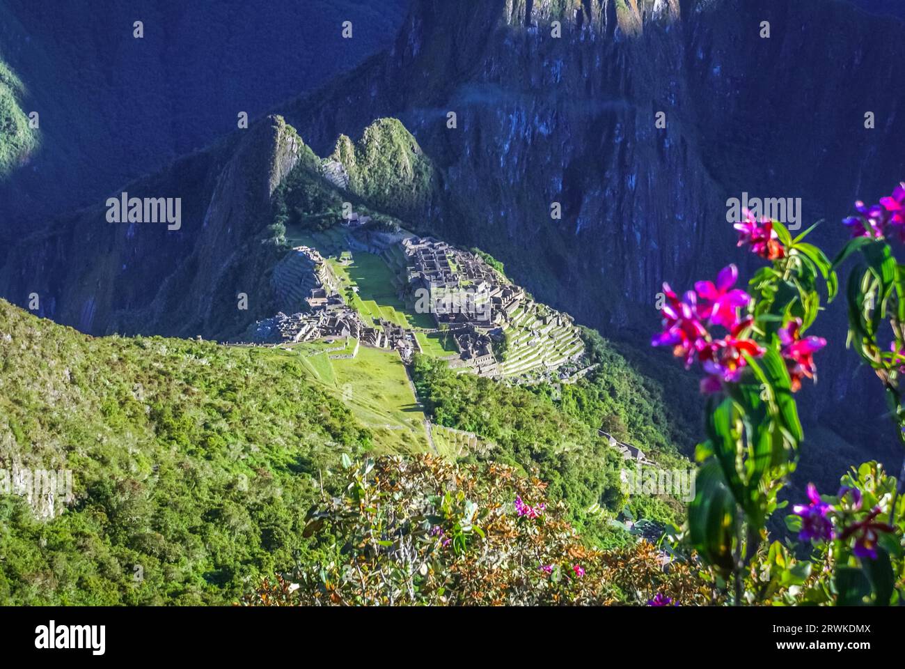 Photo of greenery and high mountains surrounding Sacred valley in Peru ...