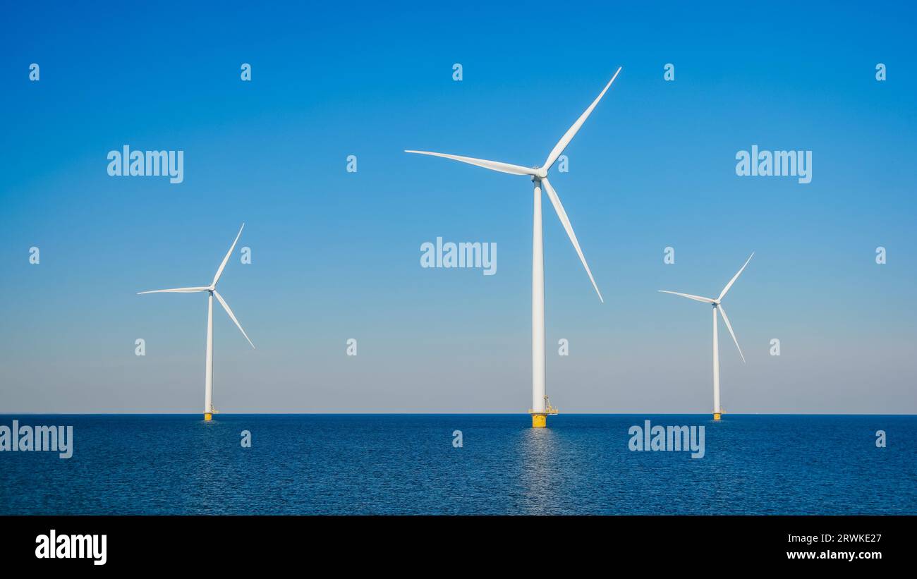 ocean Wind Farm. Windmill farm in the ocean. Offshore wind turbines in ...