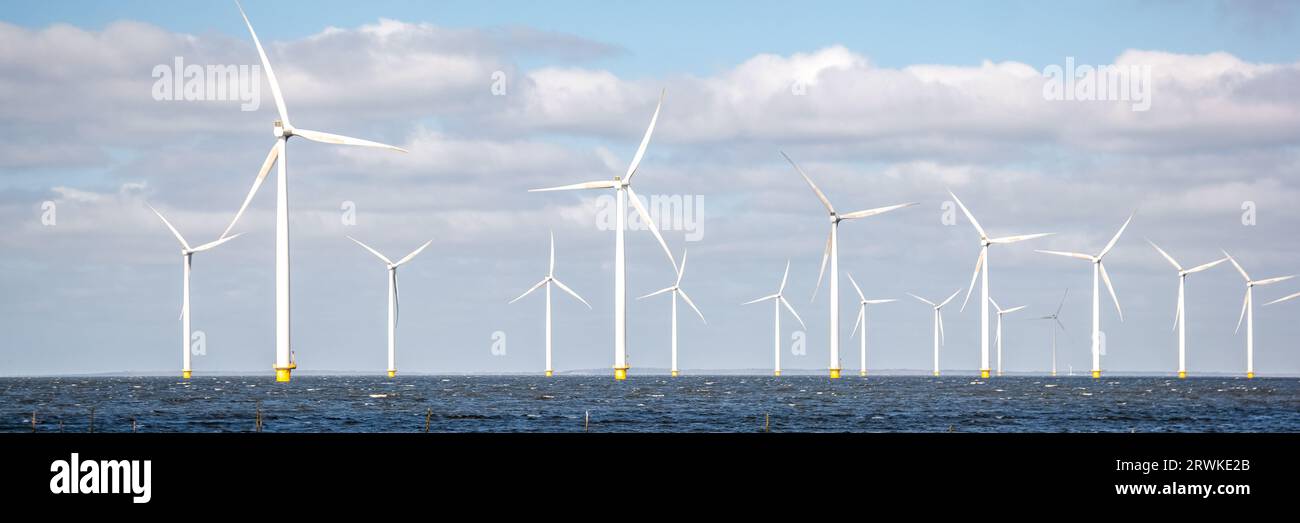 ocean Wind Farm. Windmill farm in the ocean. Offshore wind turbines in ...