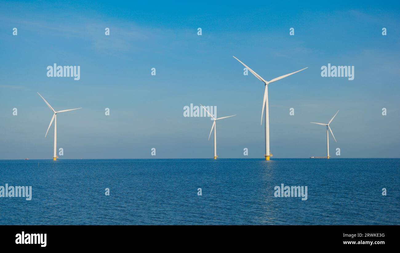 ocean Wind Farm. Windmill farm in the ocean. Offshore wind turbines in ...