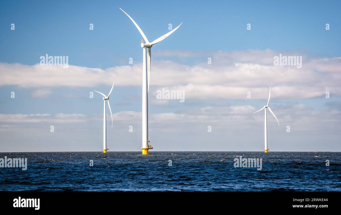 ocean Wind Farm. Windmill farm in the ocean. Offshore wind turbines in ...