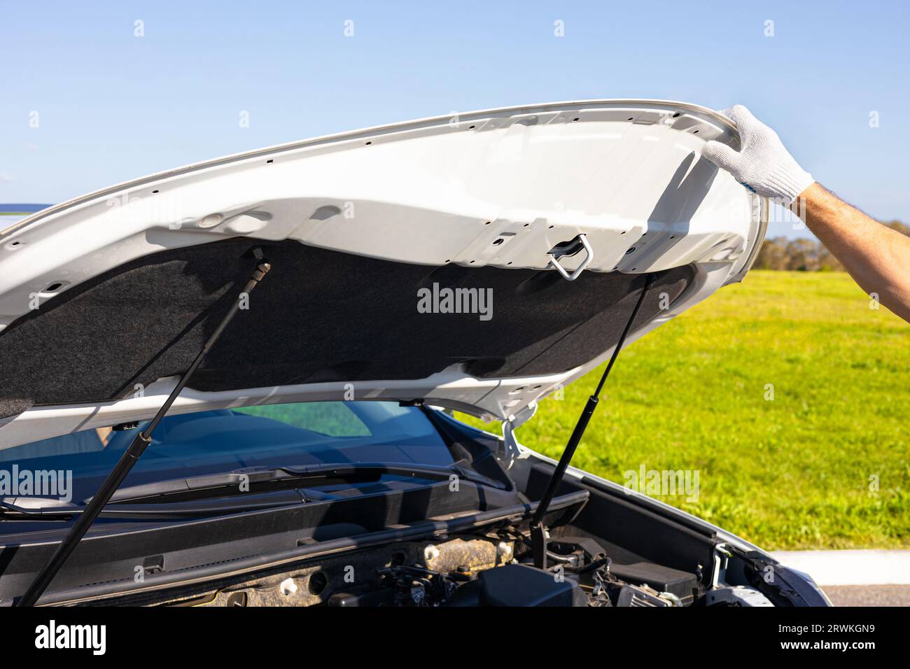 Man opens hood car hi-res stock photography and images - Alamy