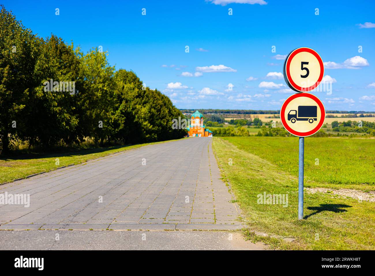 road sign limiting the speed of movement and the passage of heavy ...