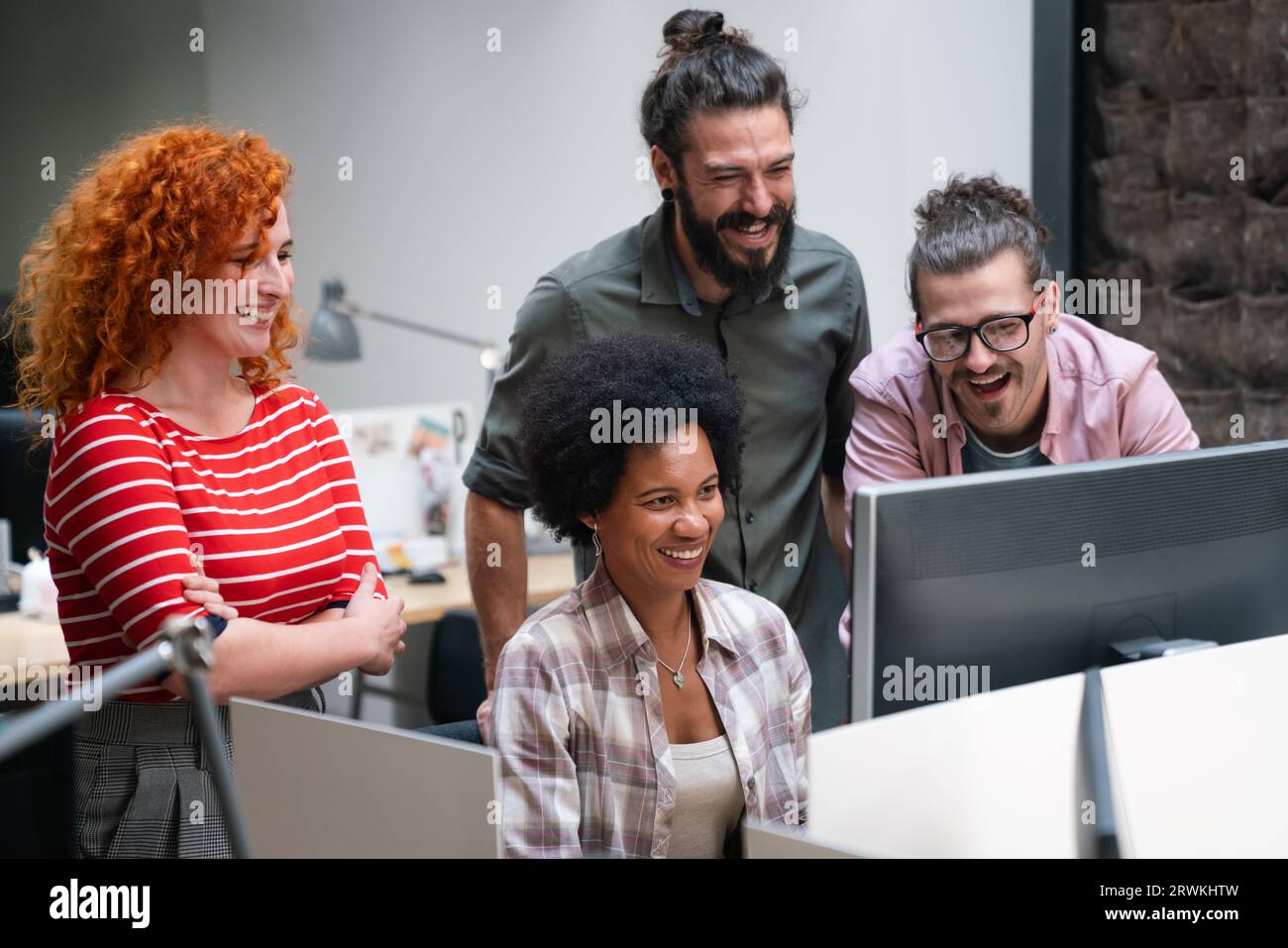 Young startup business people having fun, working and chatting at ...
