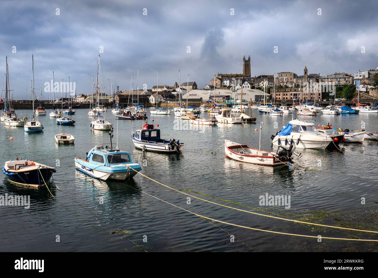 Overcast cloudy sky over boats moored in Penzance Harbour in Penzance ...