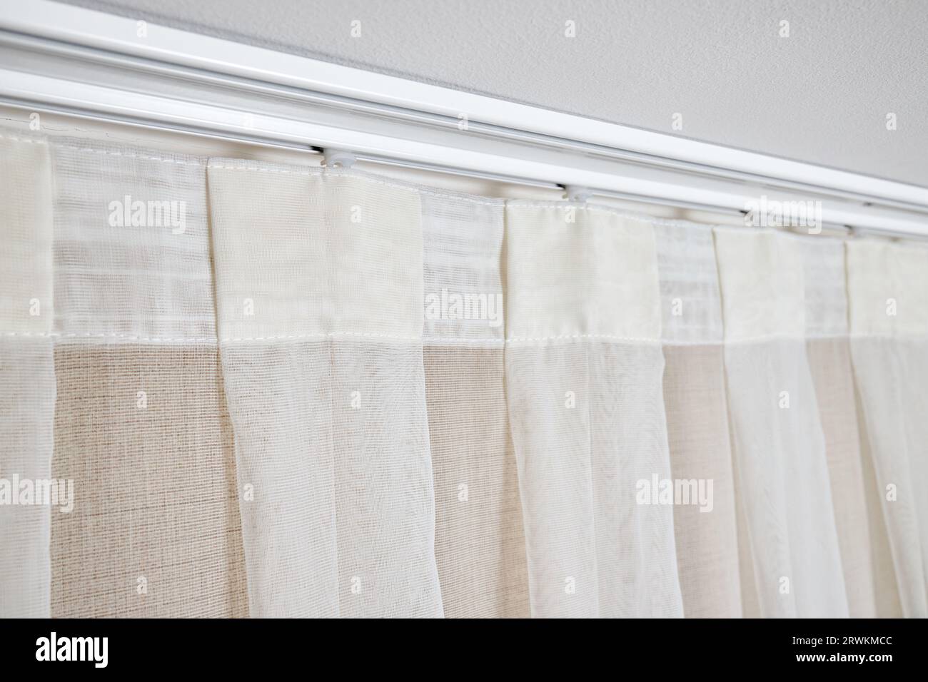 Ceiling cornice with drapes and white curtain or tulle. Interior ...