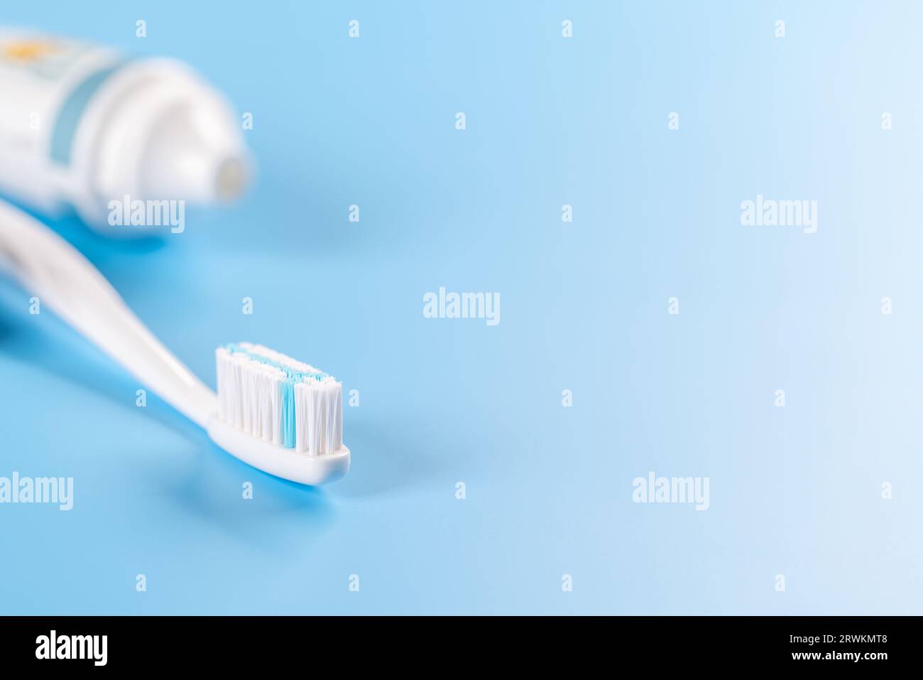 A clean and refreshing image featuring toothpaste and toothbrush ...