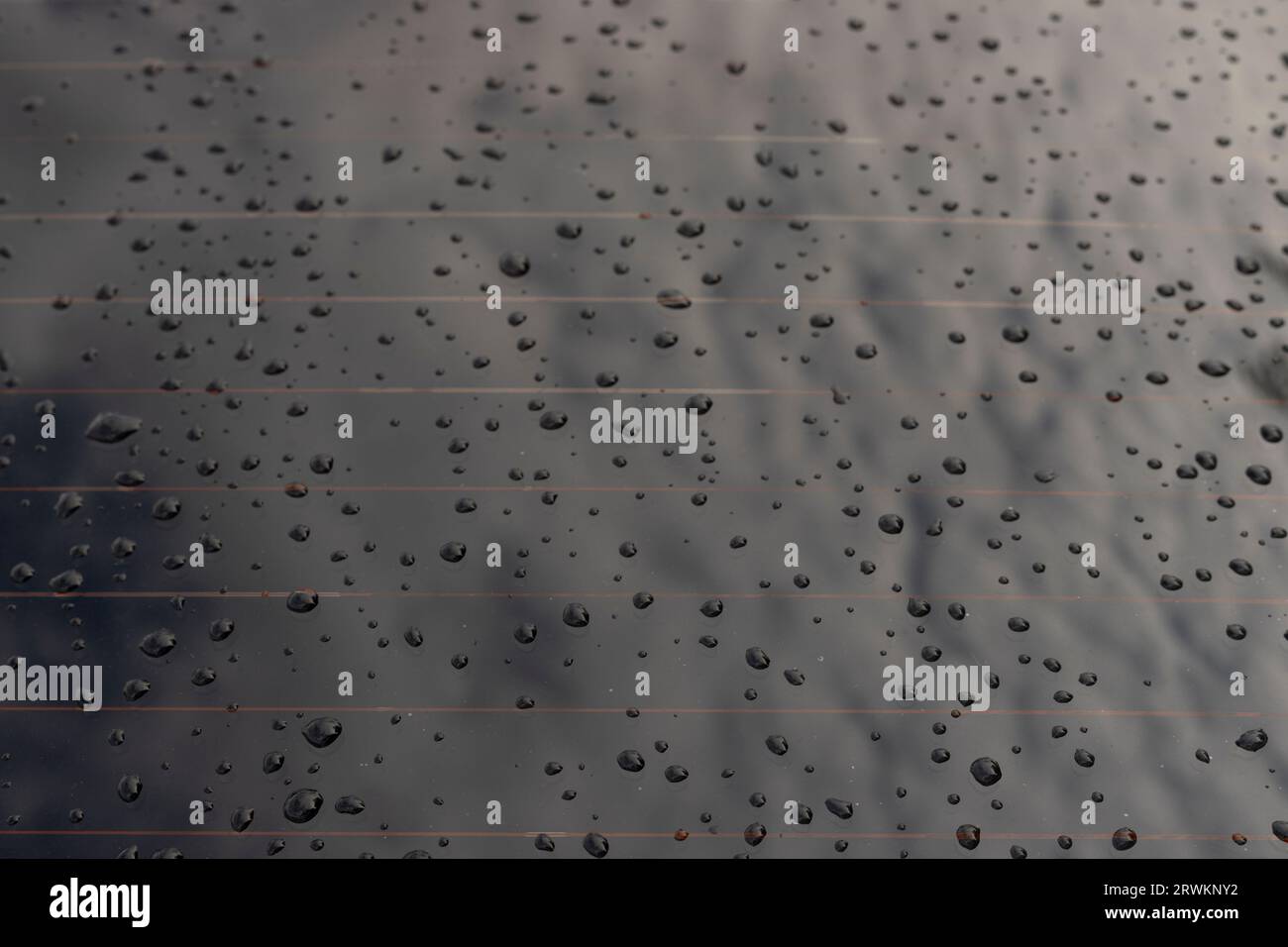 Water drop on rear window of a vehicle. Raindrops texture background ...