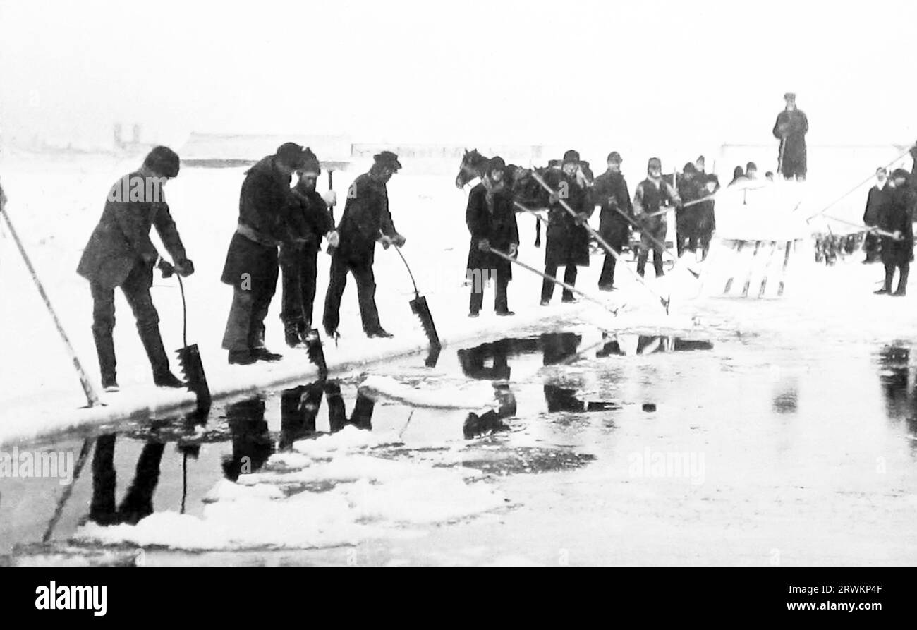 Cutting blocks of ice Black and White Stock Photos & Images - Alamy
