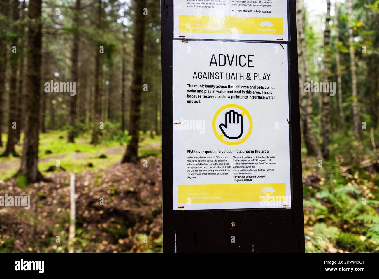 PFAS over guideline values, signs about advice against bath and play in a forest Stock Photo - Alamy