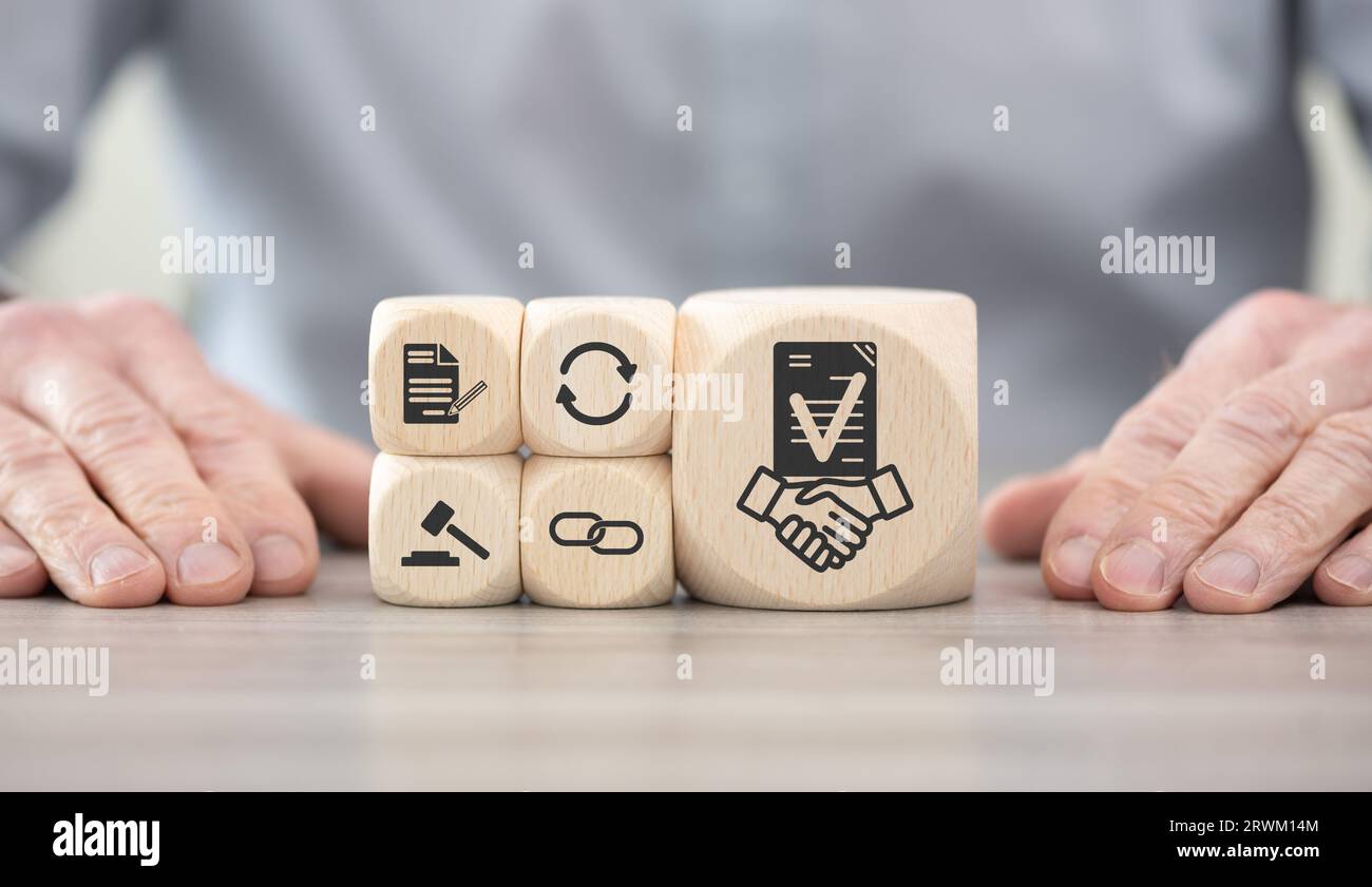 Wooden blocks with symbol of deal concept Stock Photo - Alamy