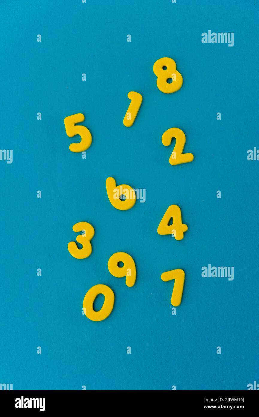 numbers from o to nine, yellow on blue backdrop Stock Photo - Alamy