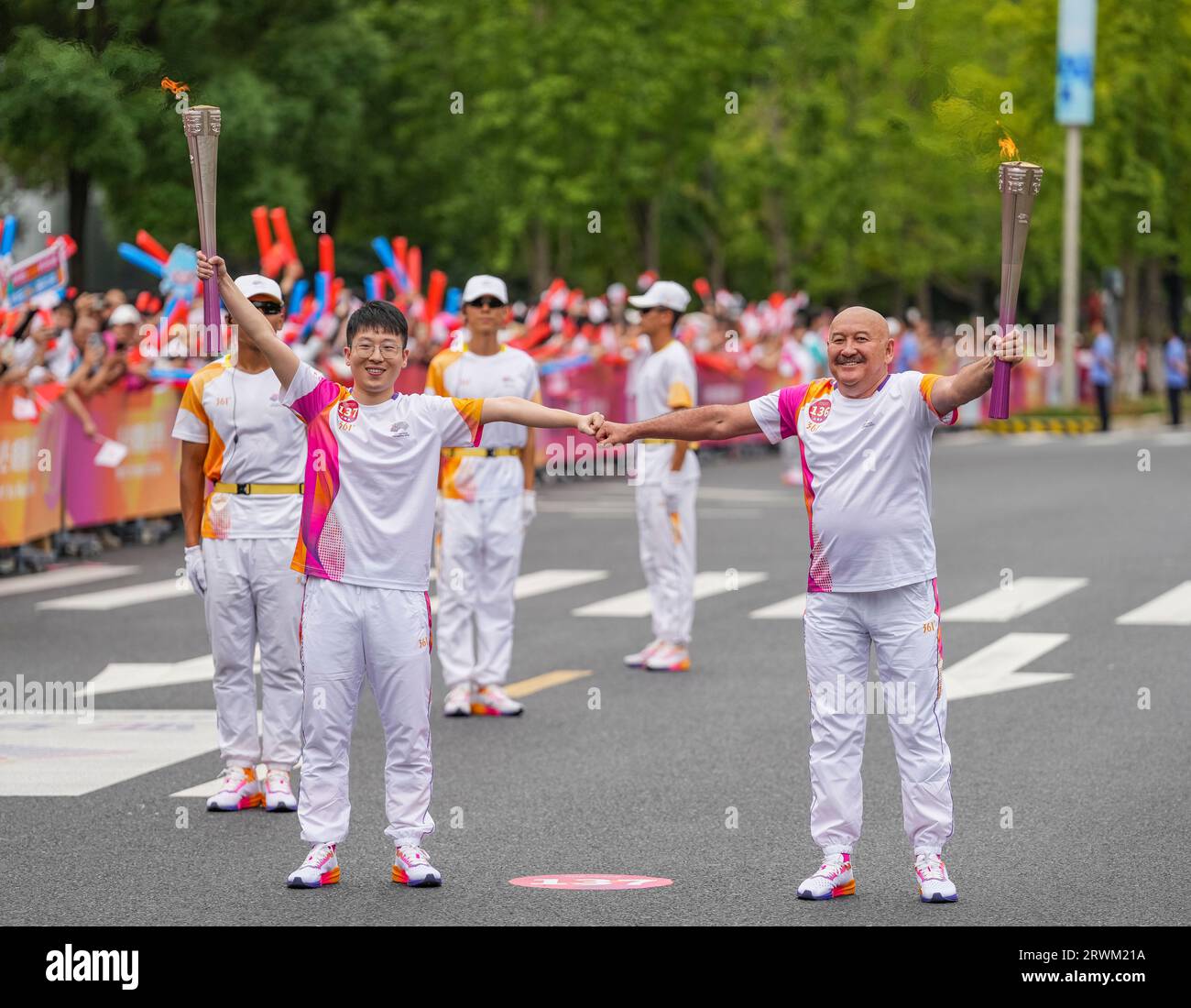 Hangzhou, China's Zhejiang Province. 20th Sep, 2023. Torch bearers ...