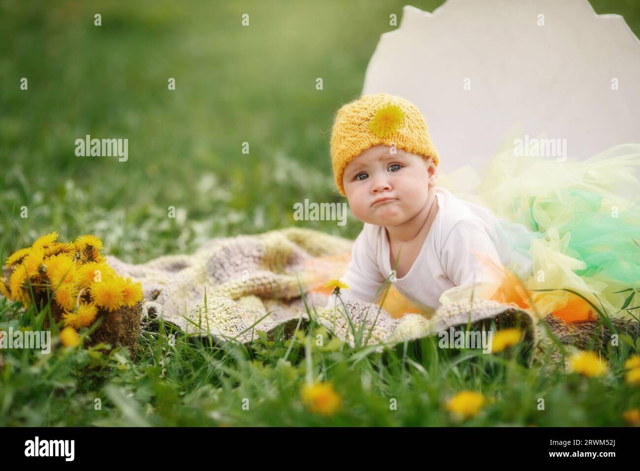 Pretty baby girl in egg shell Stock Photo - Alamy