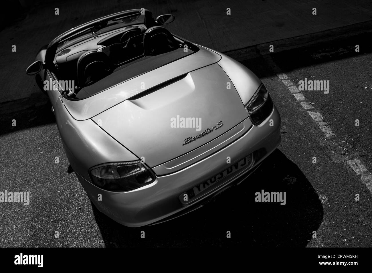 Rear view of a Porsche Boxter parked in an urban compound Stock Photo ...