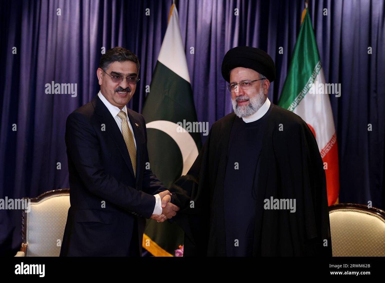 New York, USA. 19th Sep, 2023. Iranian President EBRAHIM RAISI (R ...
