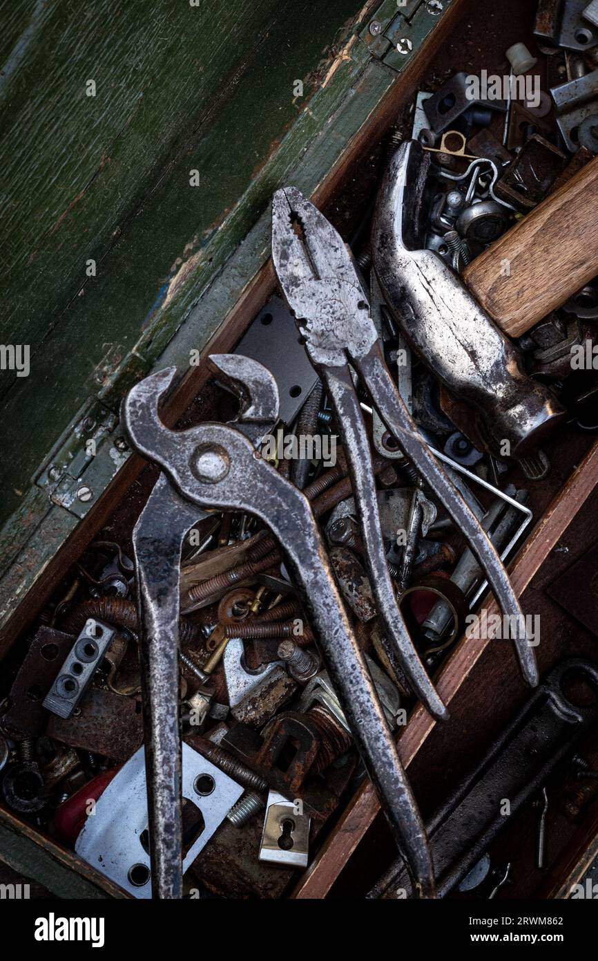 Old work tools lie on a wooden tool box Stock Photo - Alamy