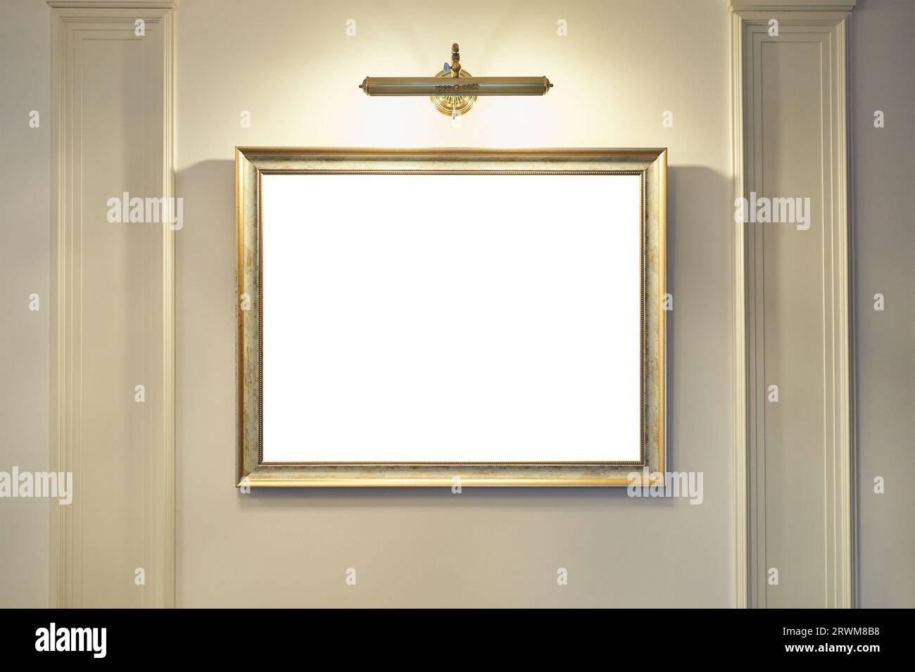 Frame without a picture on a wall with isolated white space Stock Photo ...