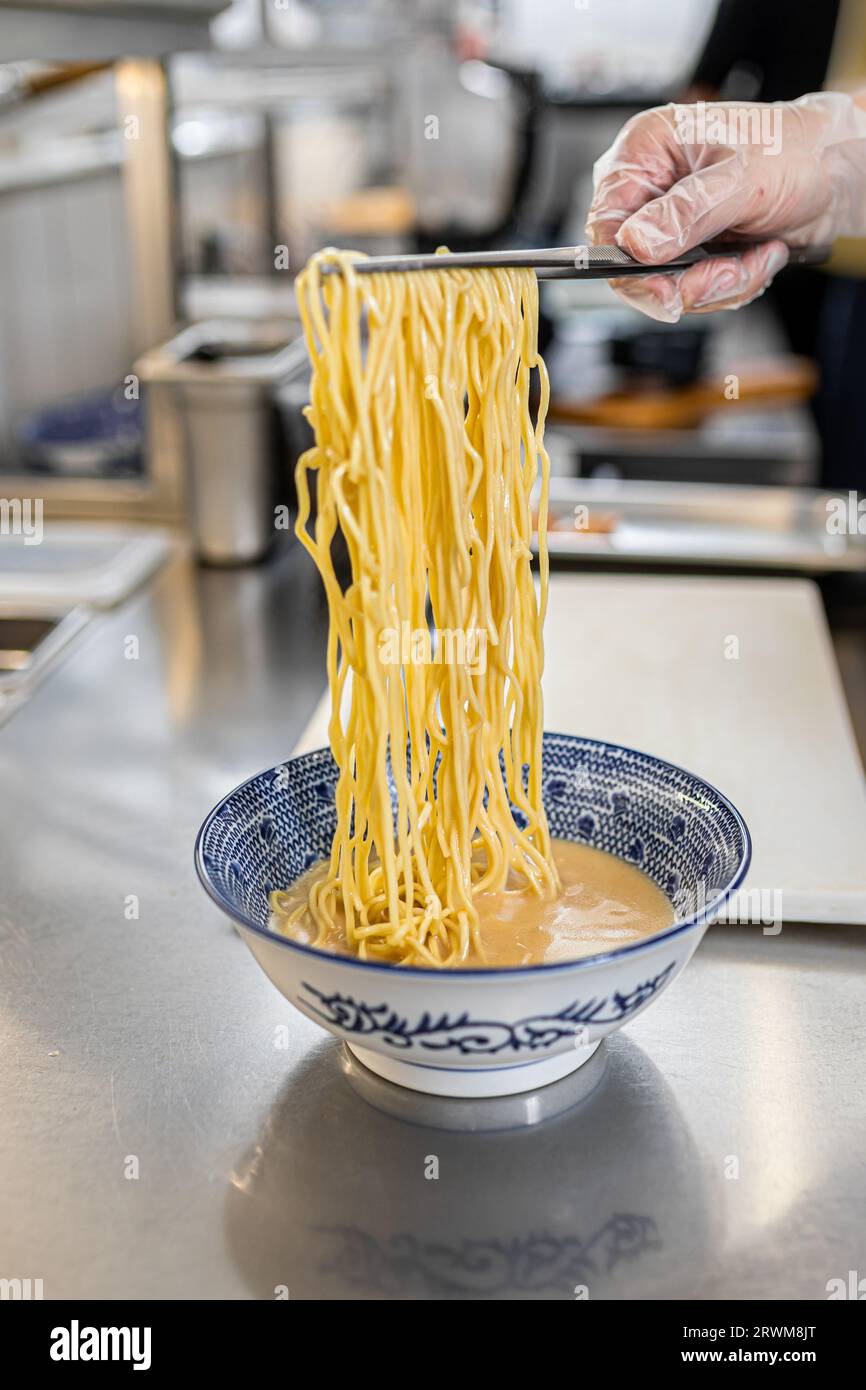 Chef making japanese ramen noodle soup Stock Photo - Alamy