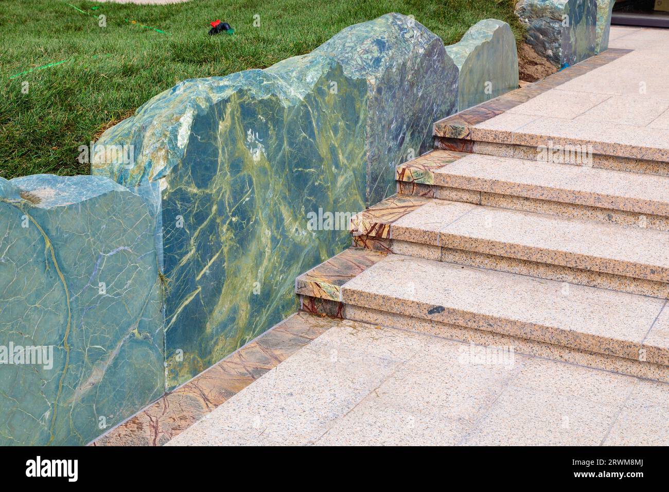 Landscaping, pathway edging with steps and diabase stone boulders Stock ...