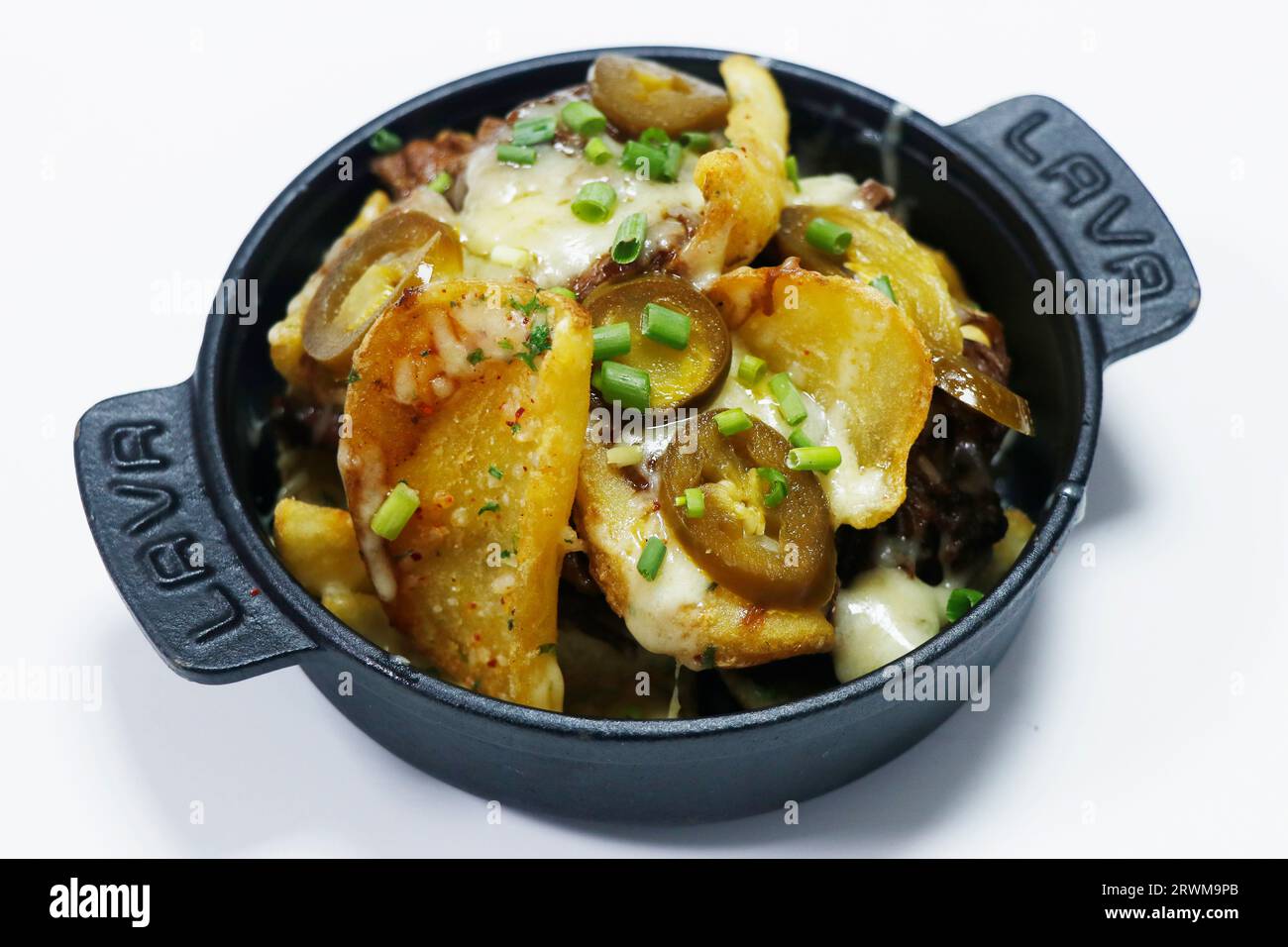 cheese gratinated potato chips with jalapeno chili pepper and beef ...